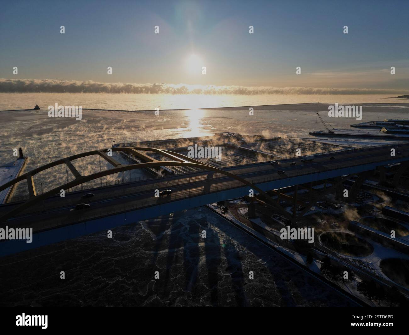 With temperatures below zero, steam rises over Lake Michigan Tuesday ...
