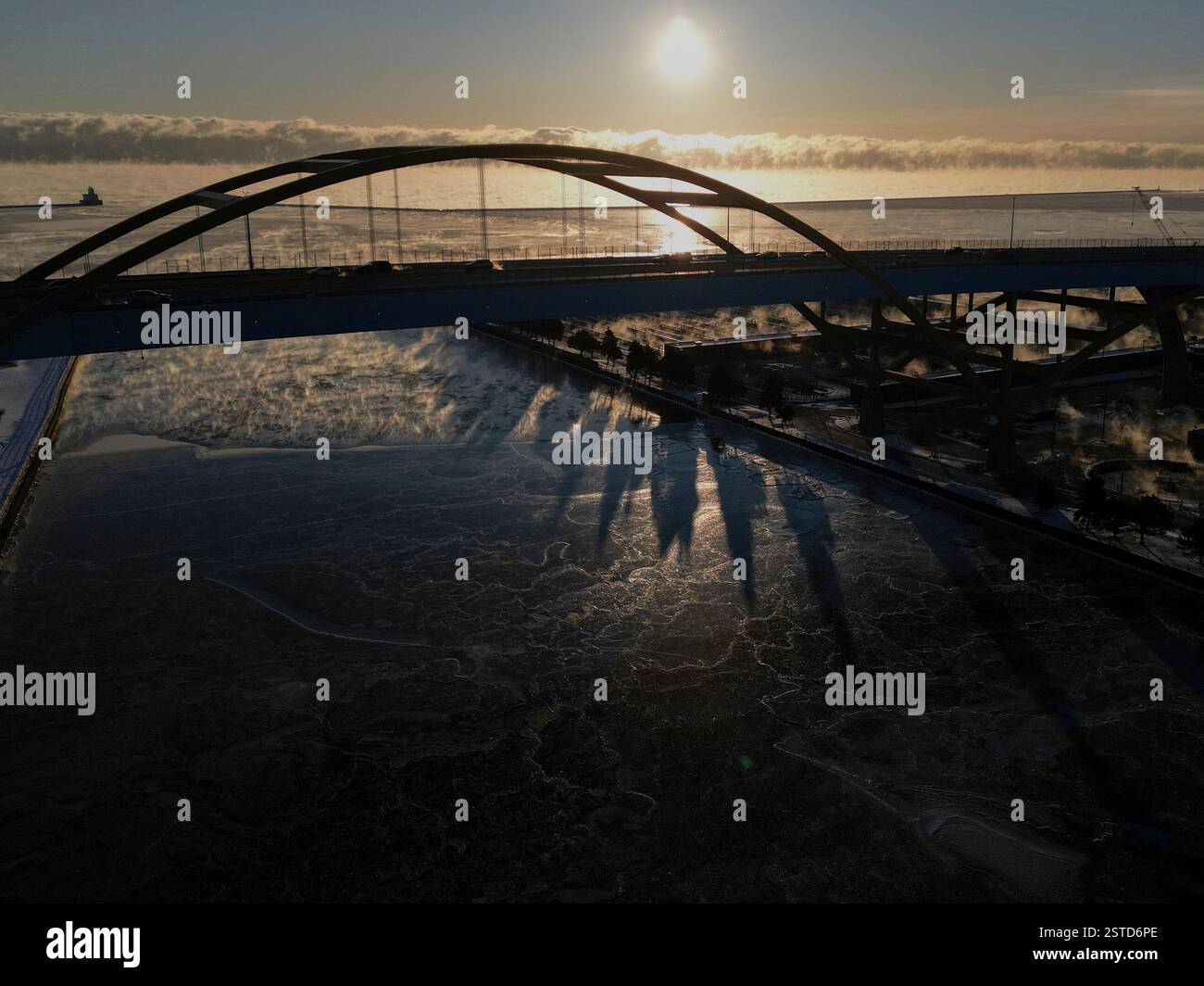 With temperatures below zero, steam rises over Lake Michigan Tuesday ...