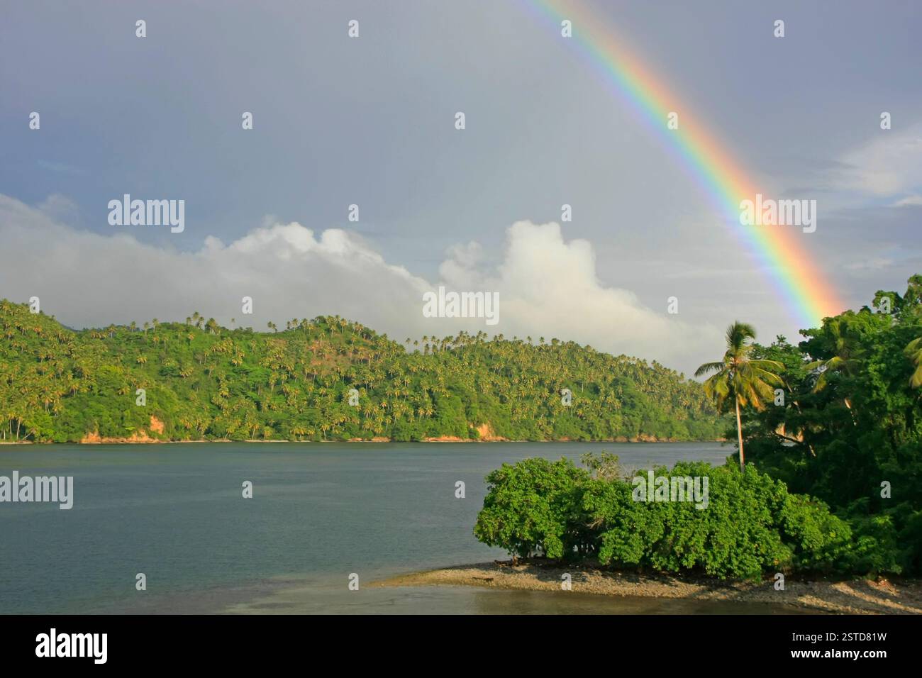 Rainbow over hills of Samana Stock Photo - Alamy