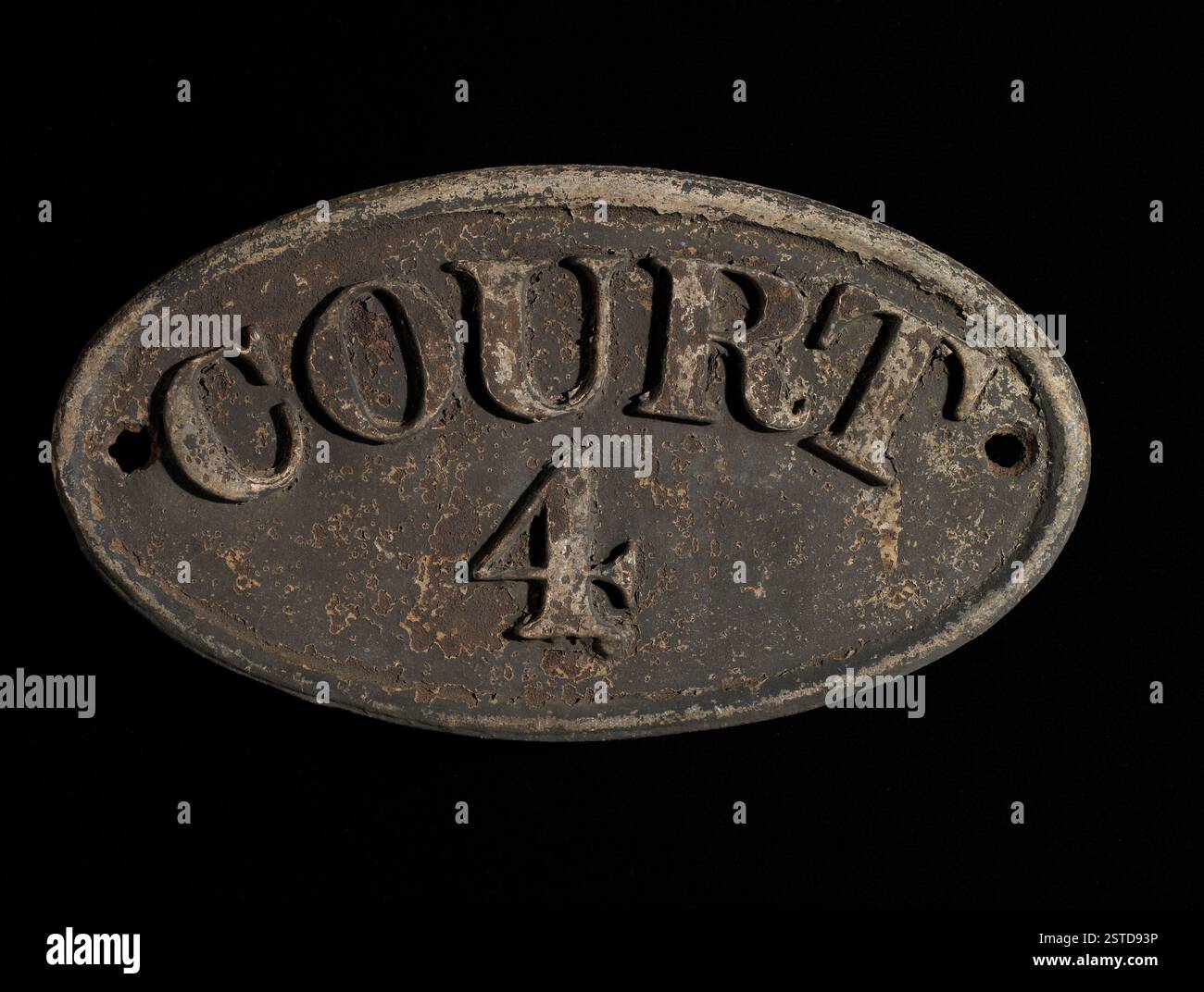 A cast iron street sign from 1875-1910, marking Court 4 outside back-to ...