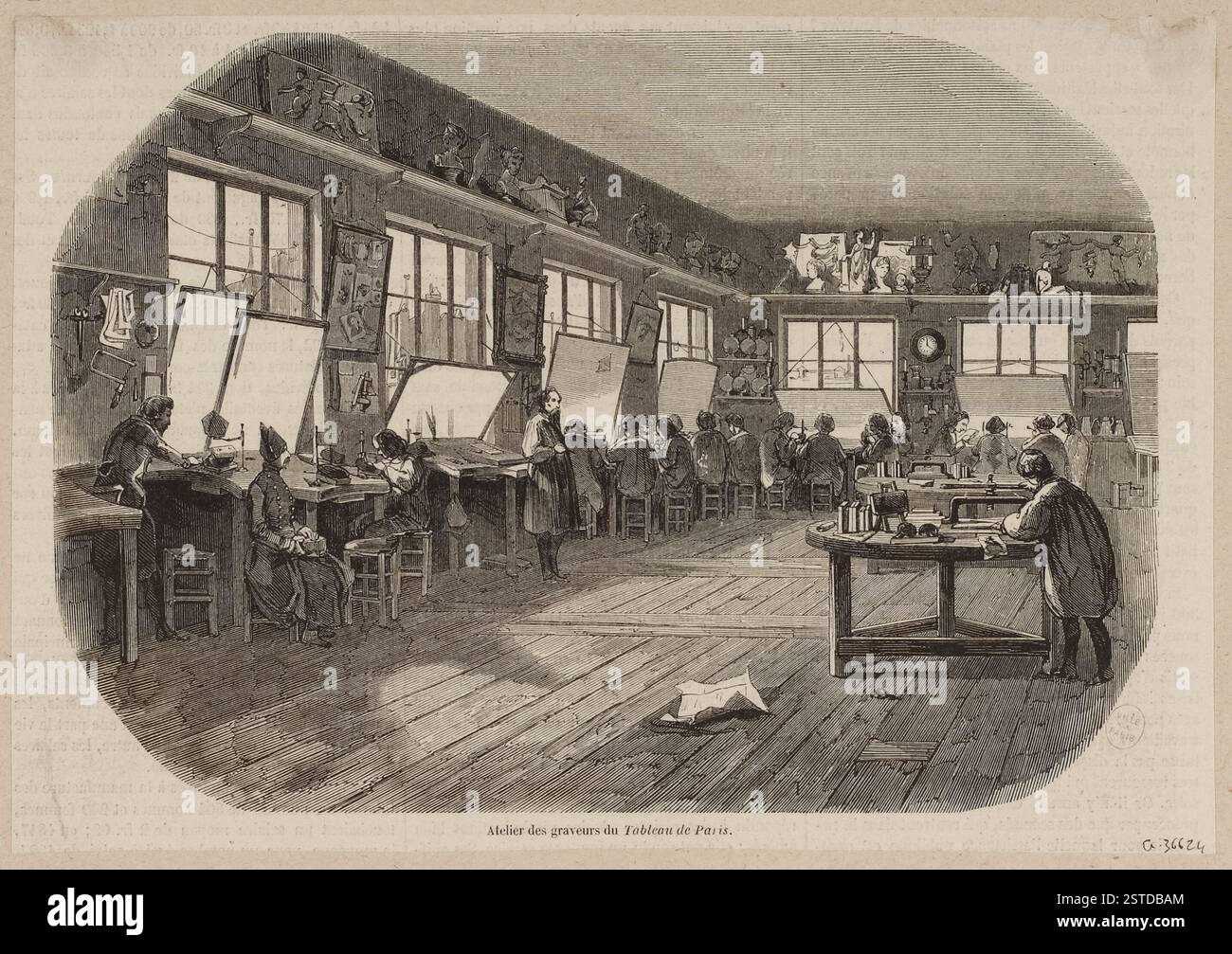 Engravers work in their workshop, carefully crafting designs using a ...