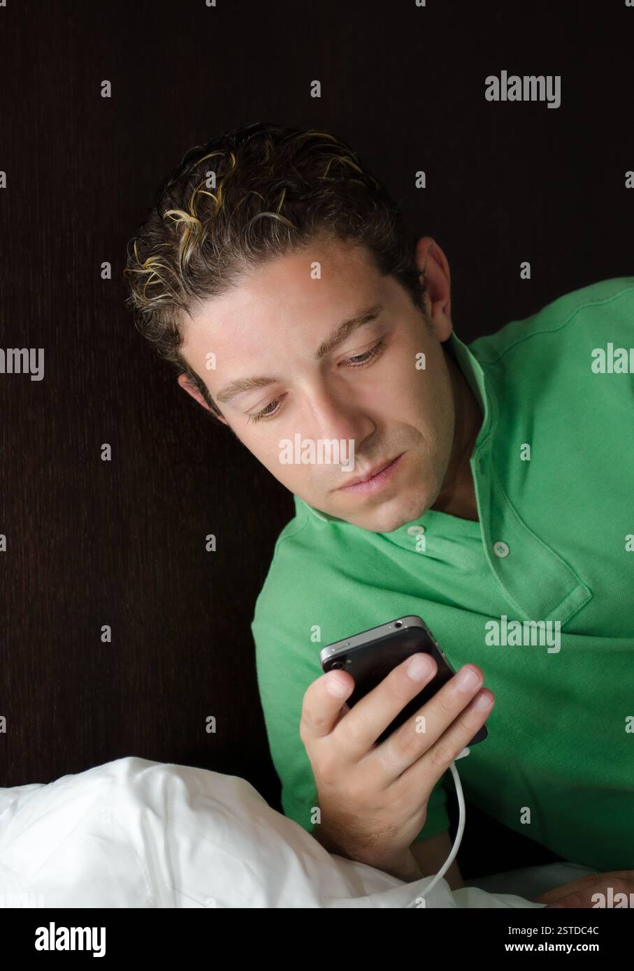 Mobile phone bed night hi-res stock photography and images - Alamy