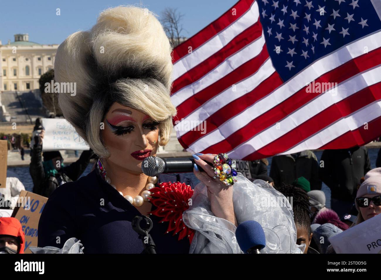 Performer Tara Hoot delivers a speech during the rally against the ...