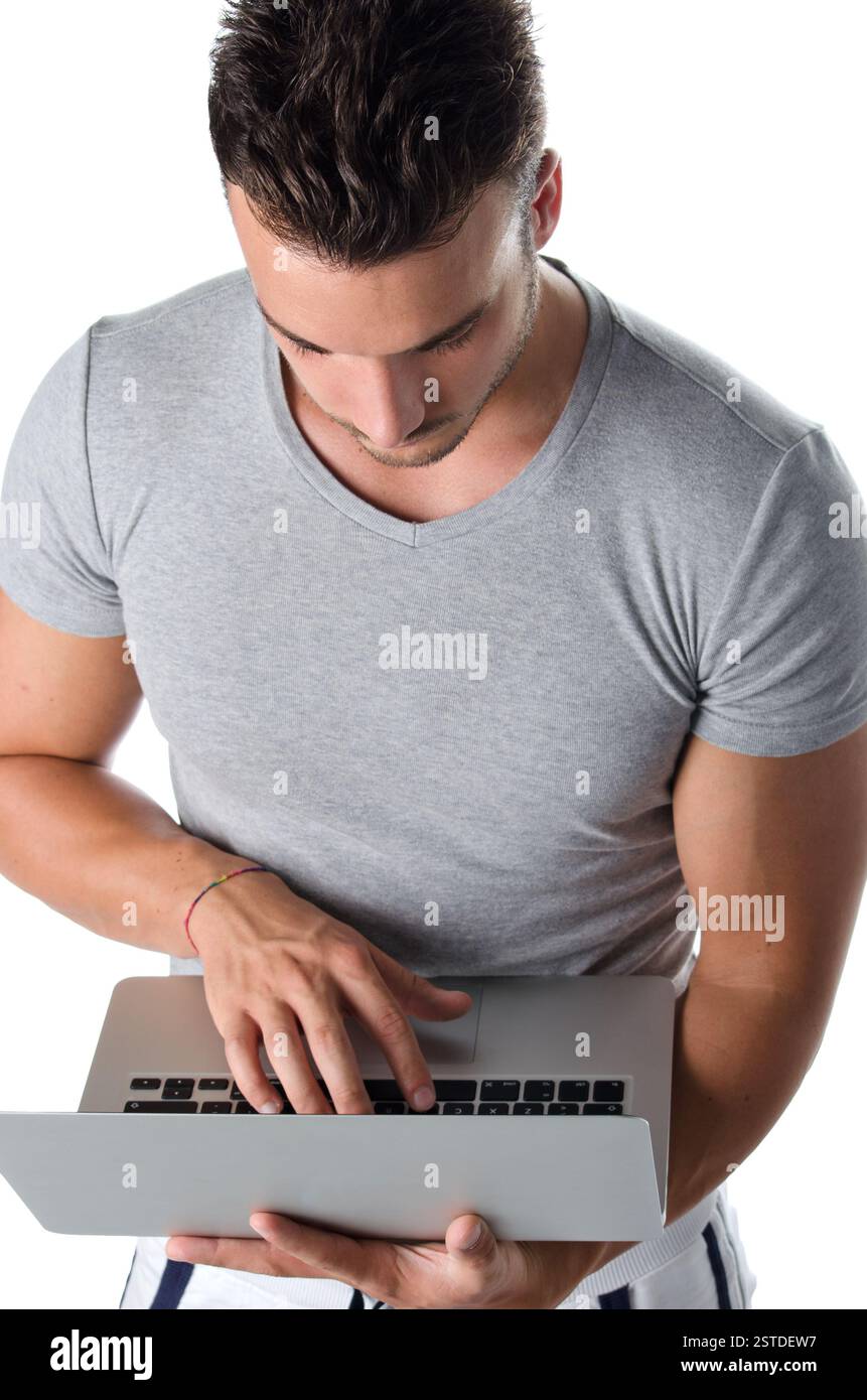 Handsome man standing using hi-res stock photography and images - Alamy