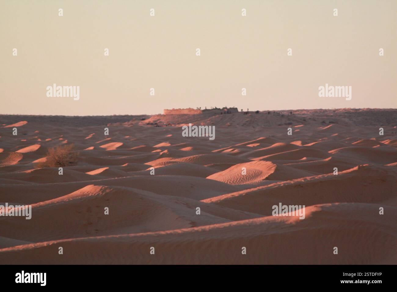 Military forts in the Sahara desert in Tunisia with dunes illuminated ...