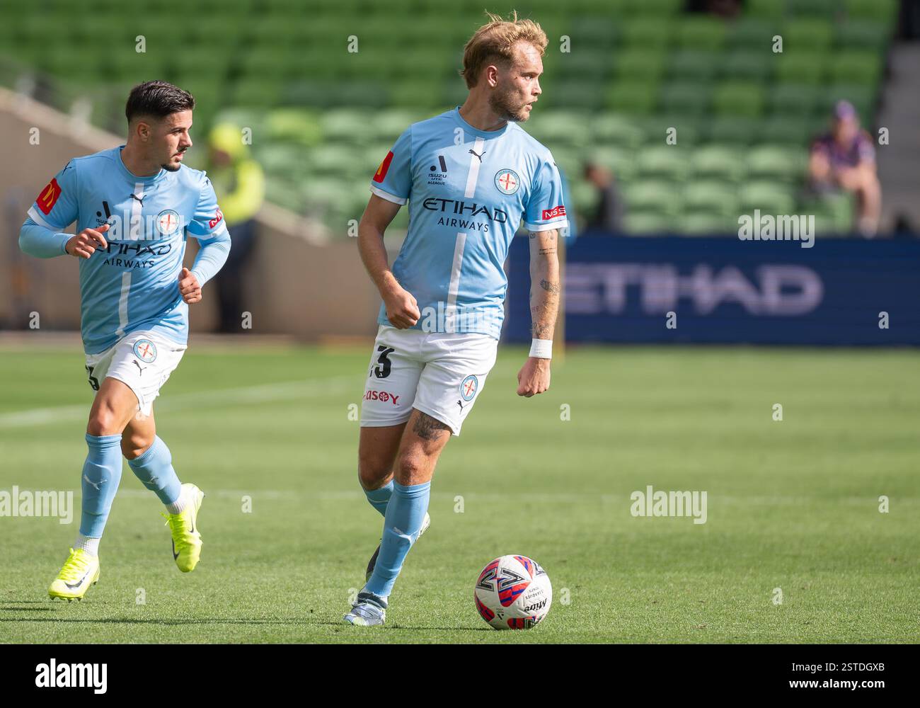 Marco Tilio (L) and Nathaniel Atkinson (R) of Melbourne City seen in ...