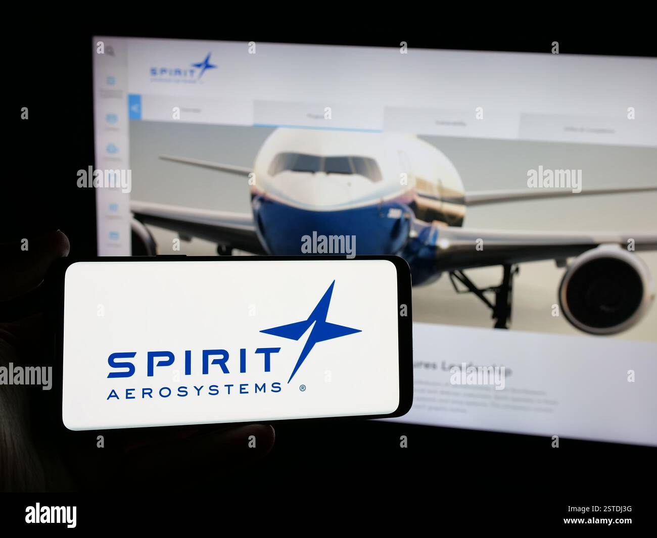 In this photo illustration, a person is holding a smartphone with the ...