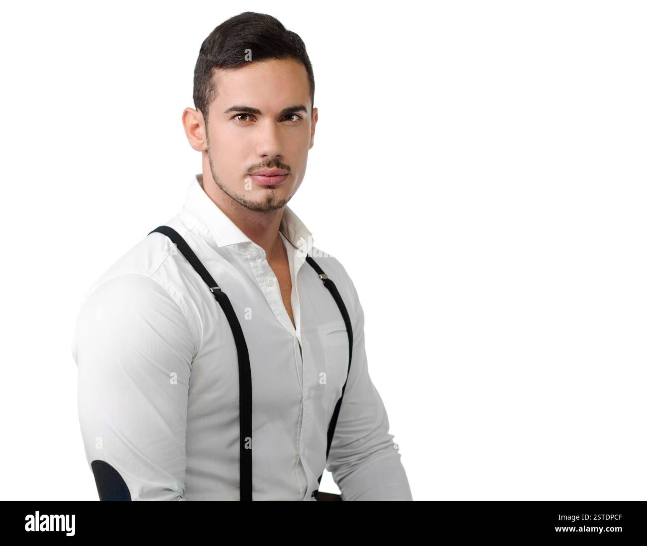 Elegant young man with white shirt and suspenders Stock Photo - Alamy