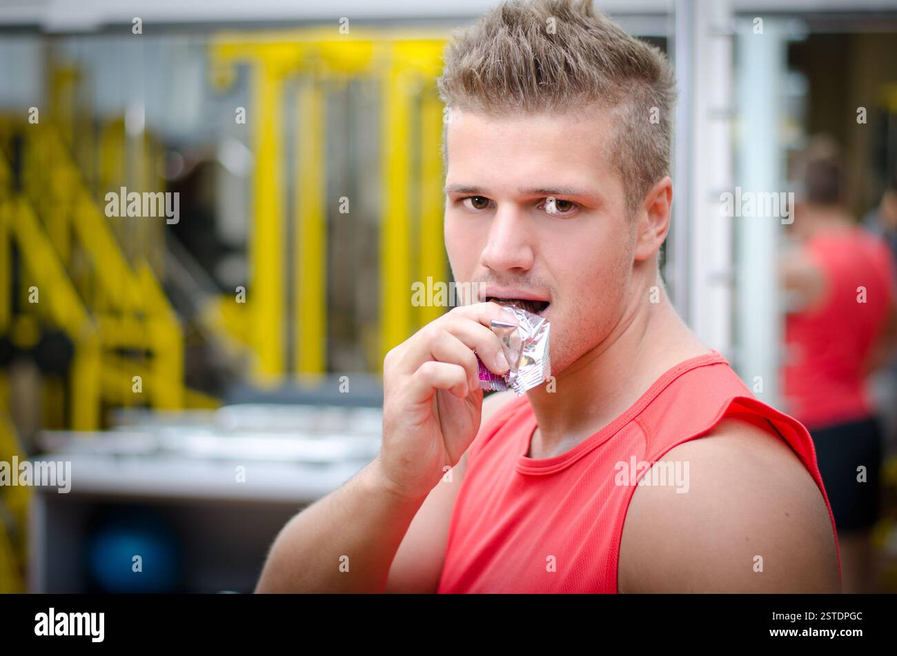 Young person with snack bar hi-res stock photography and images - Alamy