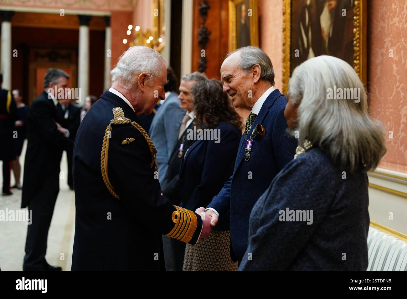 King Charles III presents the Humanitarian Medal to Gary Martin during ...