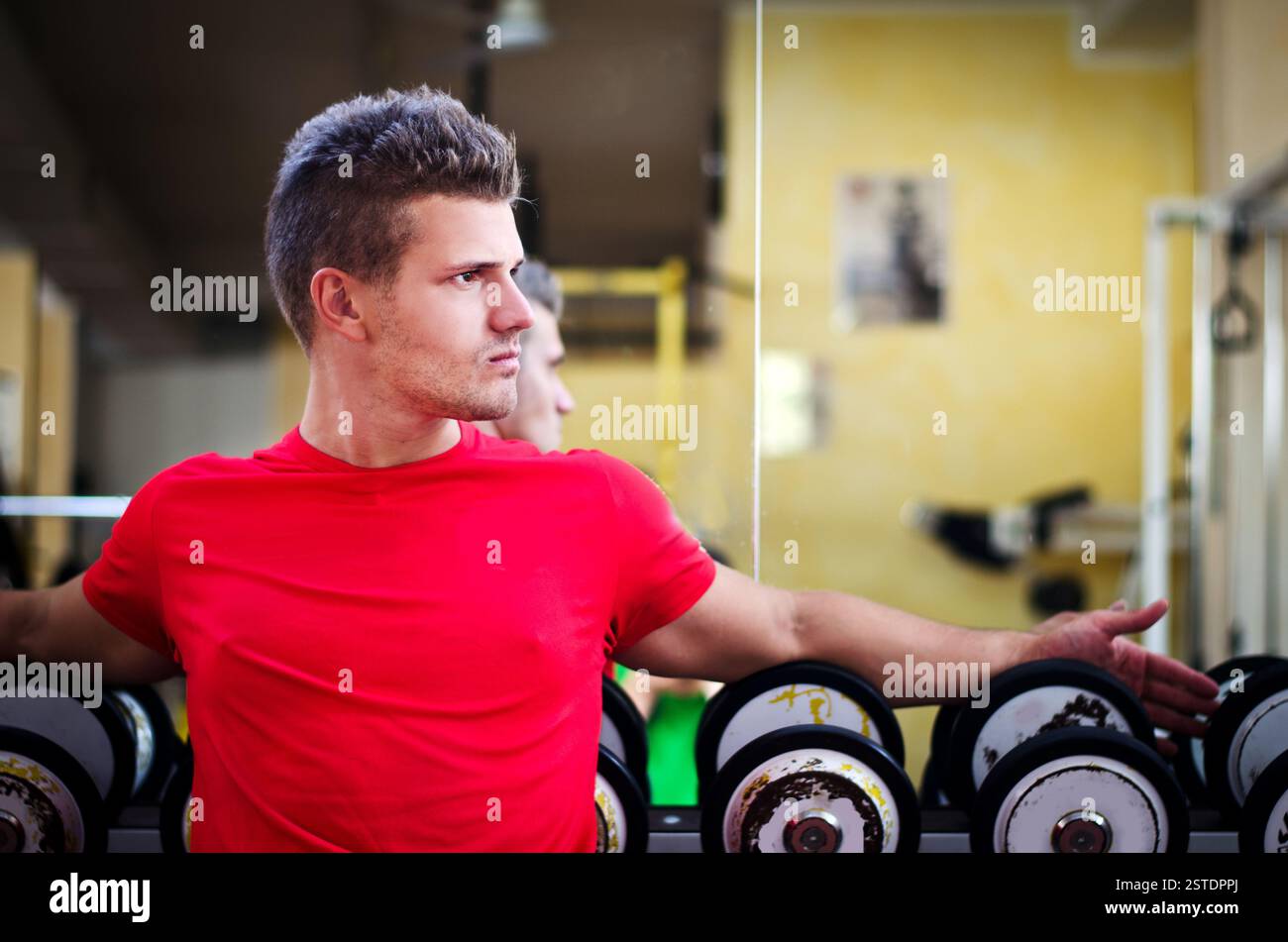 Guy sitting lifting leg hi-res stock photography and images - Alamy