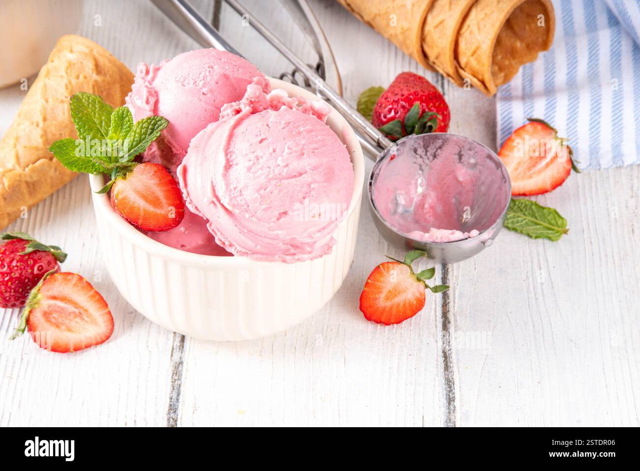 Summer refreshing cold dessert, tasty and aromatic strawberry ice cream ...