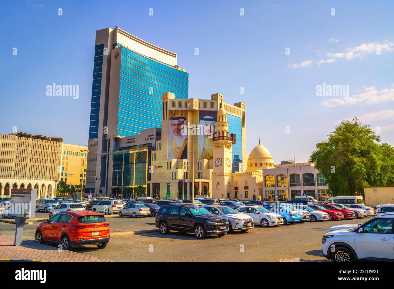 Downtown Rotana Hotel and Yateem Mosque in Manama, Bahrain Stock Photo ...