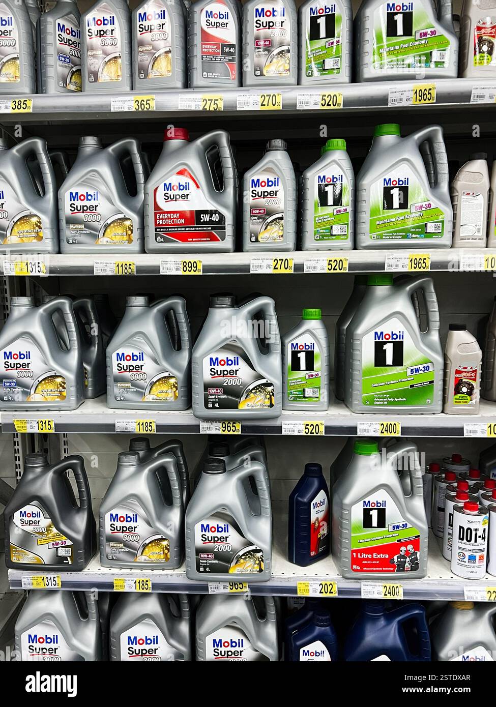 Lviv, Ukraine - February 16, 2025: Motor oil Mobil containers in a ...