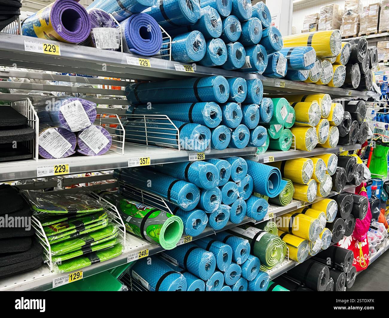 Lviv, Ukraine - February 16, 2025: Stacked yoga and exercise mats on ...