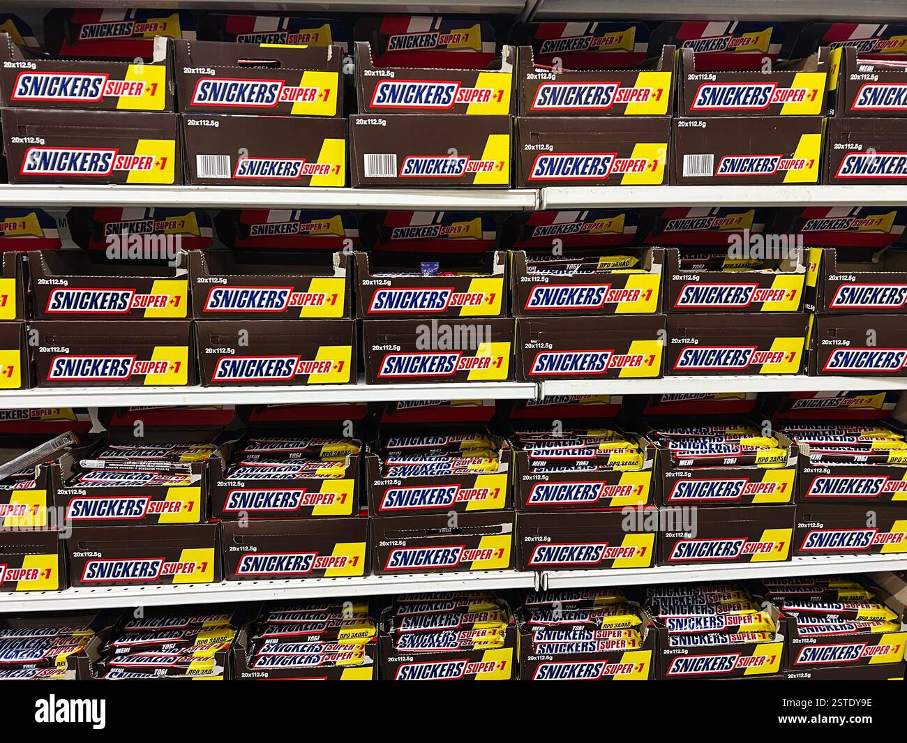 Lviv, Ukraine - February 16, 2025: Rows of Snickers chocolate bars ...