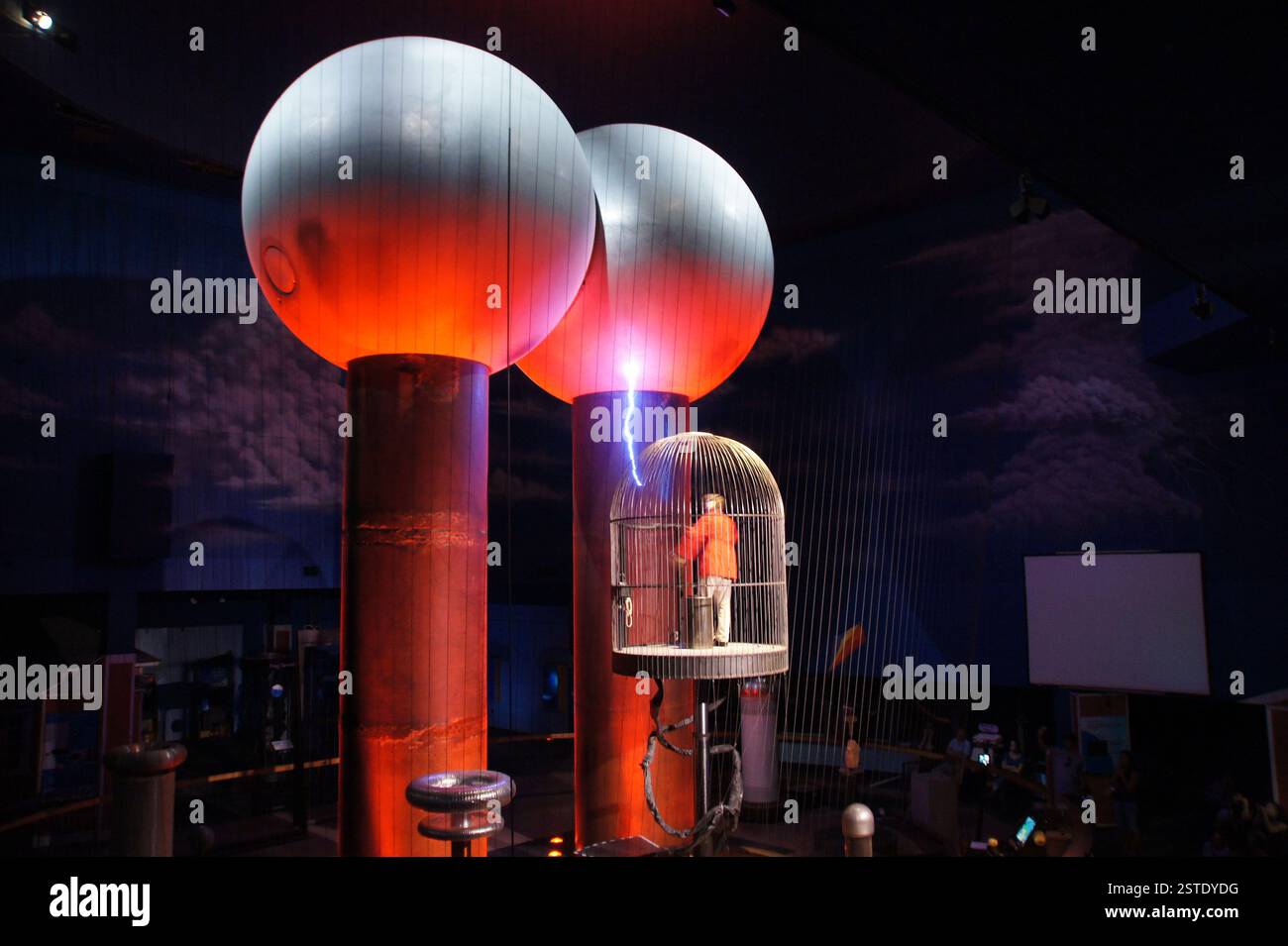 Museum exhibit in Boston. Two large, glowing spheres with sparks ...