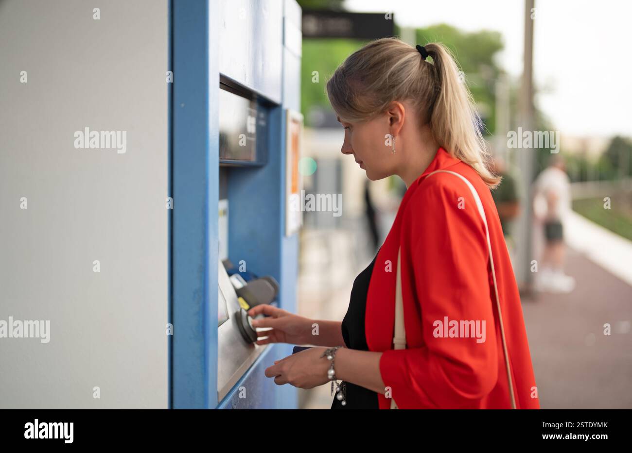 Person buys train ticket hi-res stock photography and images - Alamy