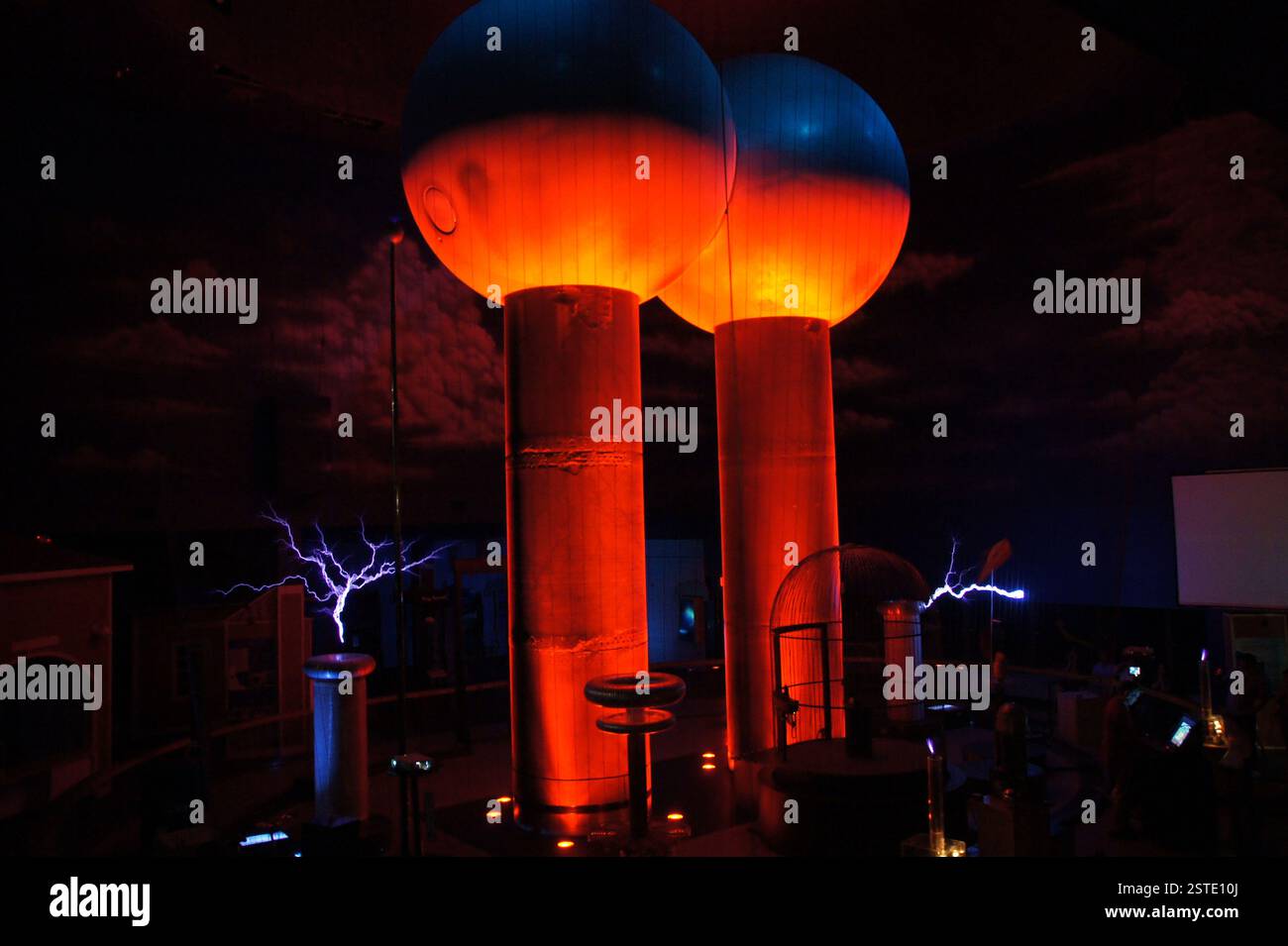 Tesla Coil exhibit, Boston. Sparks crackling between giant spheres ...