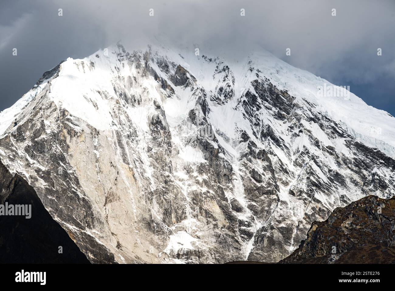Early Morning Clouds over langtang lirung mountain in the Himalayas of ...