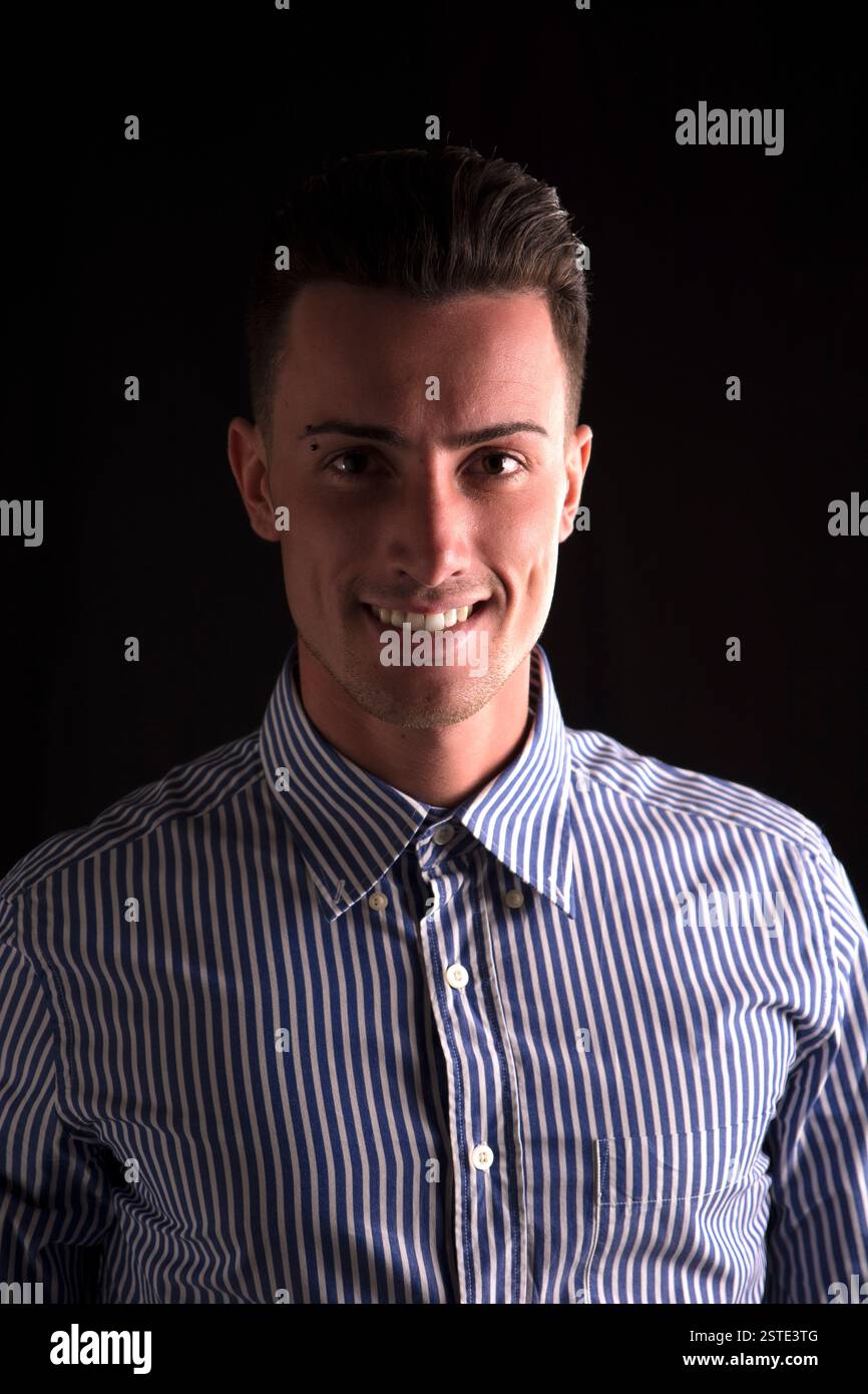Caucasian man smiling black shirt hi-res stock photography and images ...