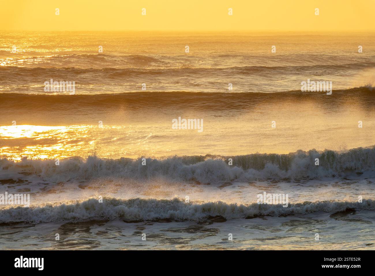 Atlantic ocean waves at sunset in Cape Cross near Swakopmund, Namibia ...