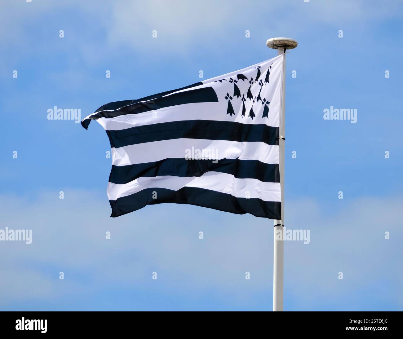Brittany flag on blue sky background Stock Photo - Alamy