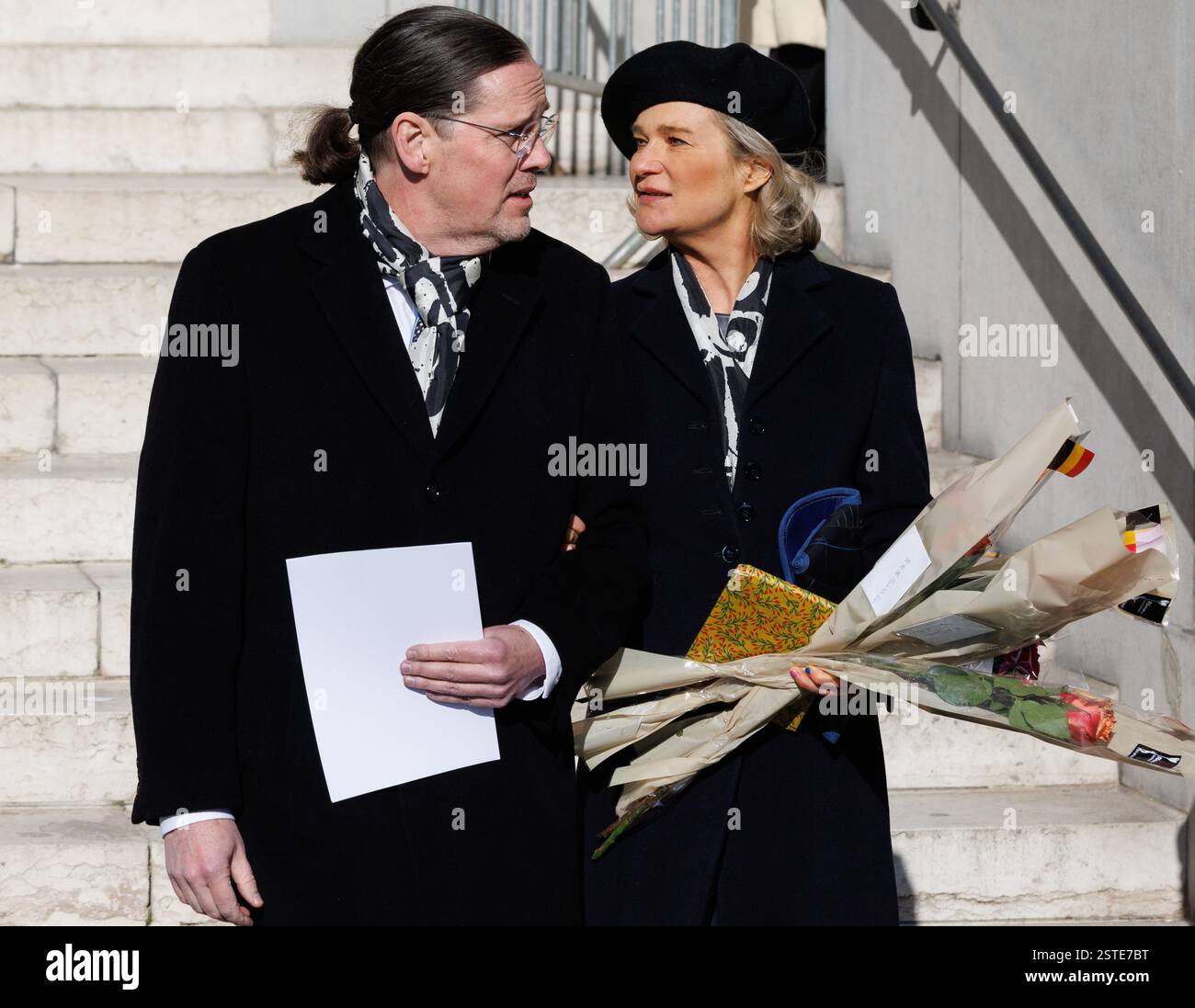 Brussels, Belgium. 18th Feb, 2025. Princess Delphine and her husband Jim O'Hare pictured after ...