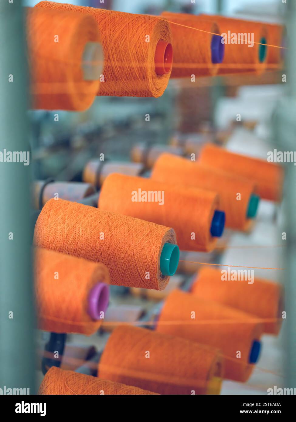 Yarn spools in a textile factory hi-res stock photography and images ...