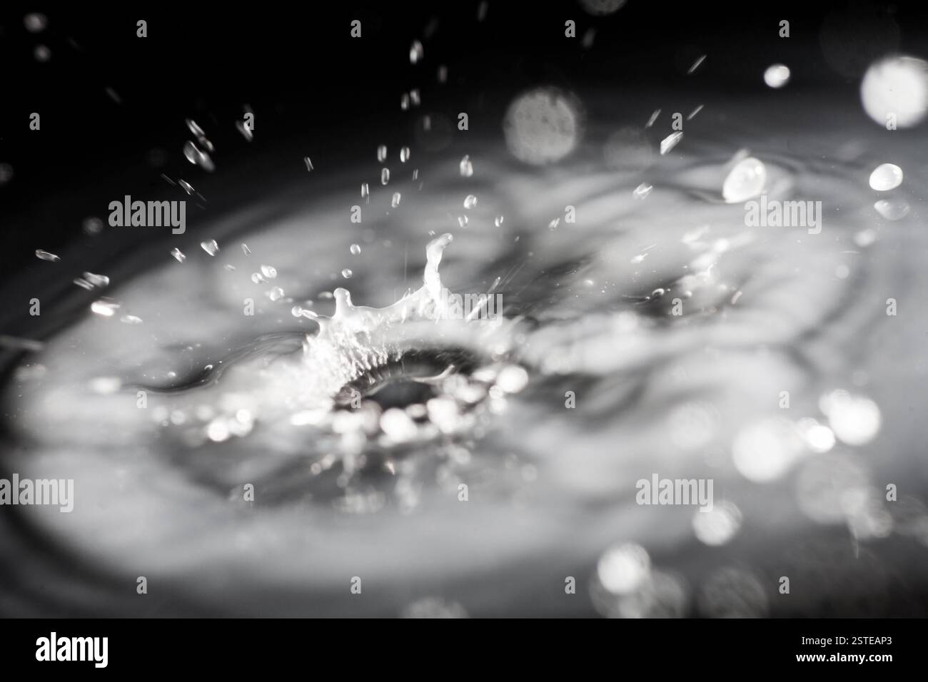 White liquid water black background hi-res stock photography and images ...