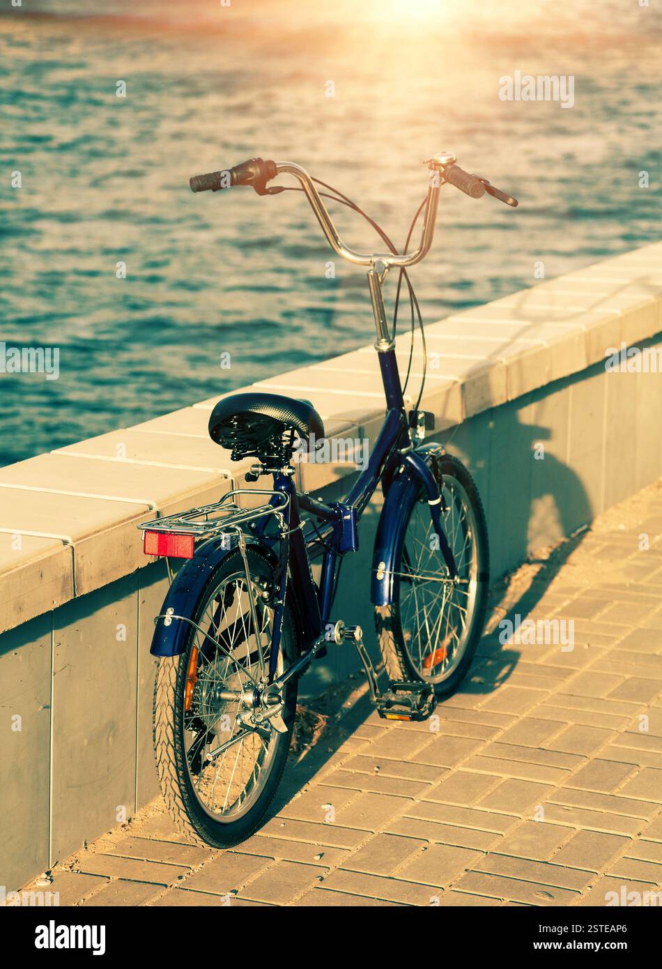 Blue kids bike near parapet hi-res stock photography and images - Alamy