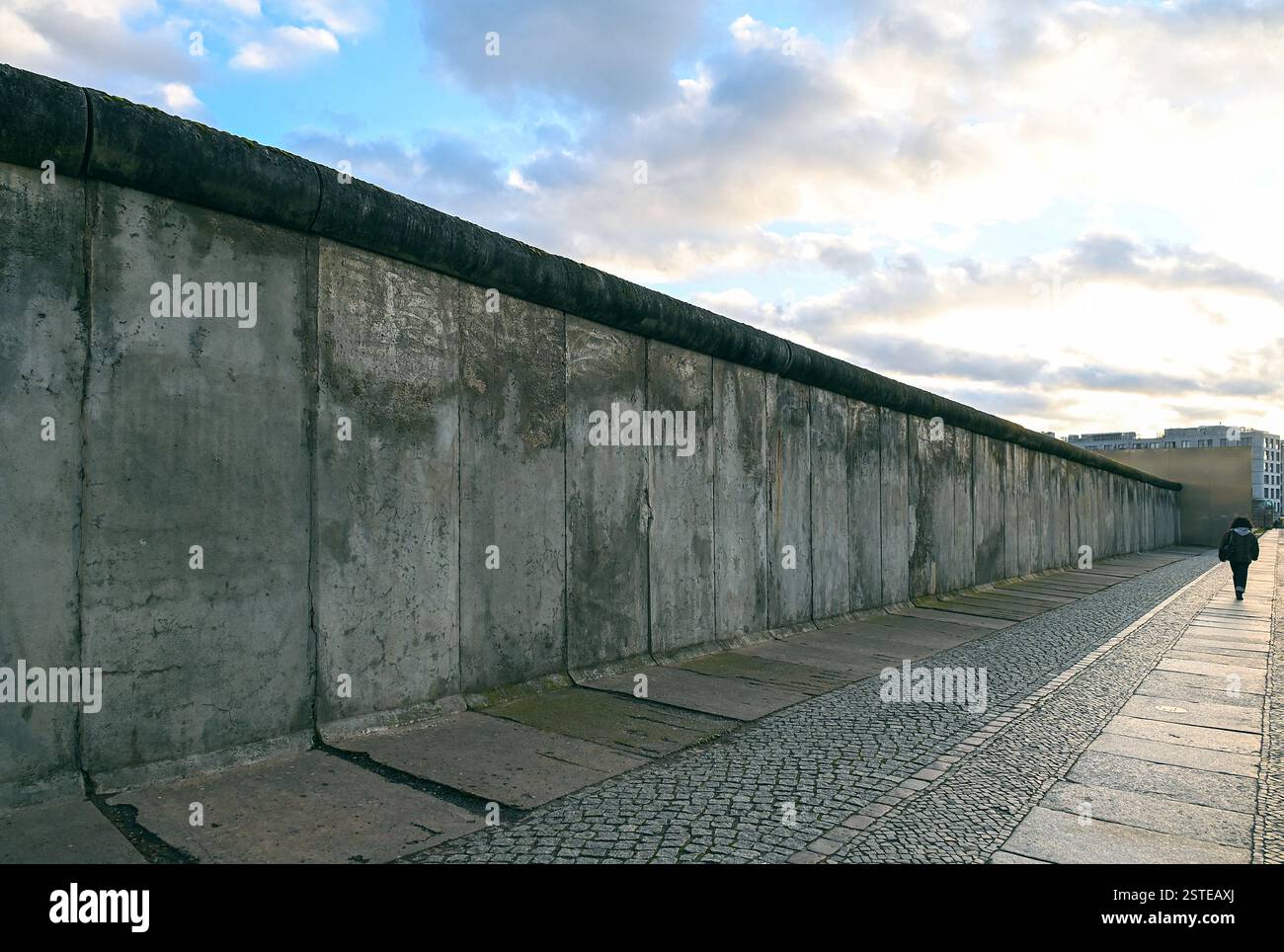 Part of Berlin Wall or Berliner Mauer with blue sky Stock Photo - Alamy