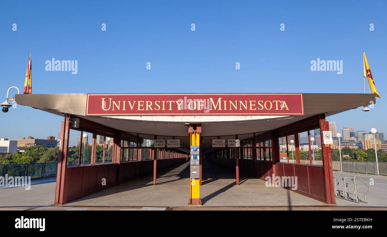 The University of Minnesota sign hangs over the entrance of the ...