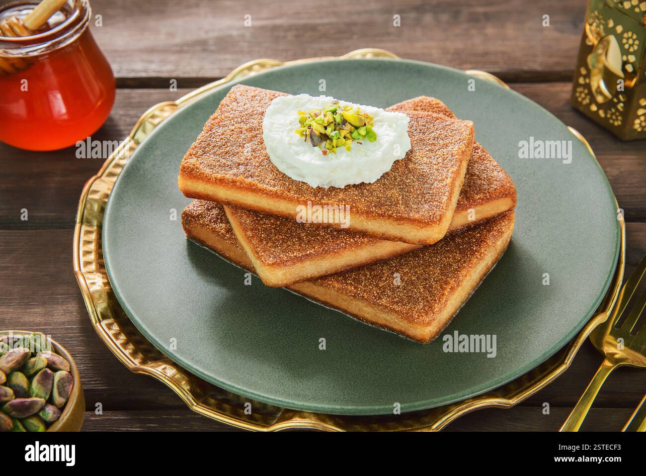 Arabic cuisine; Traditional Arabic dessert "Basbousa Bel Ashta". It's a ...