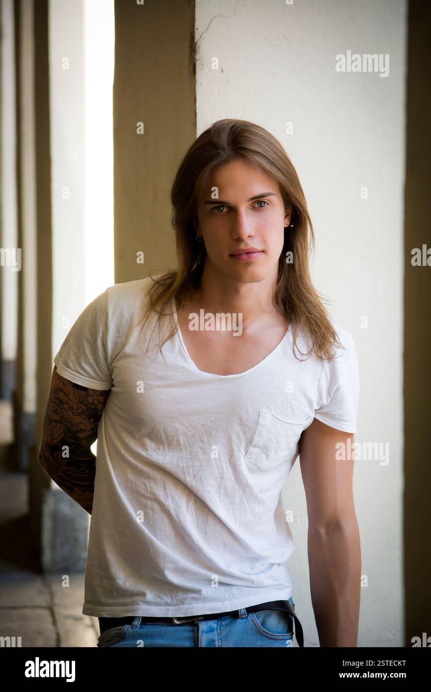 Pensive man long hair thinking hi-res stock photography and images - Alamy