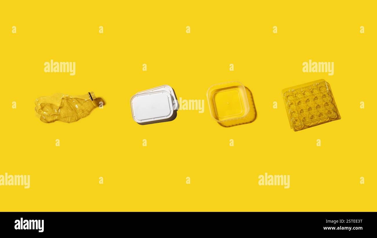 A collection of discarded single-use plastics, including a water bottle ...