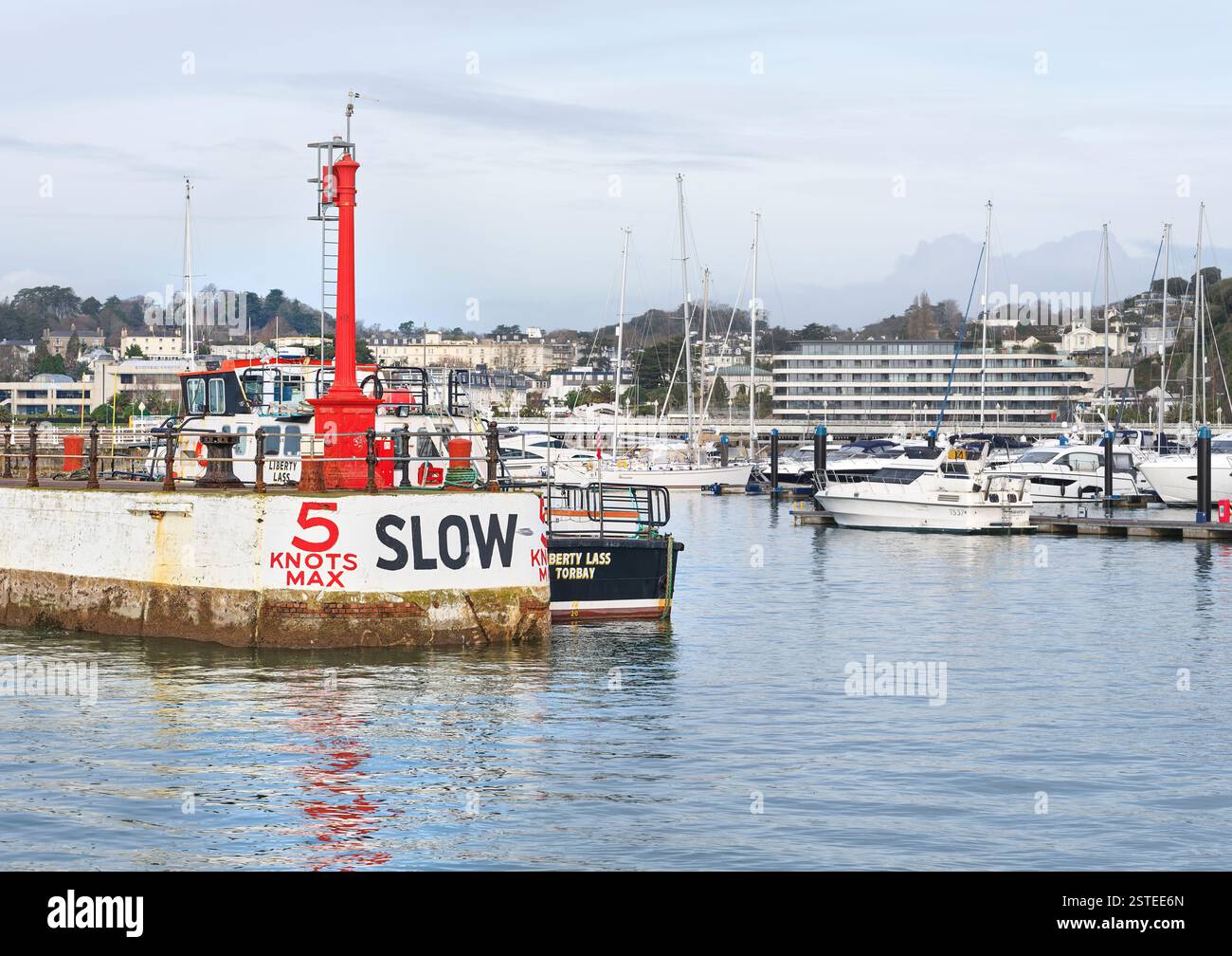 'Slow 5 knots max speed' message at the entrance to the marina at ...