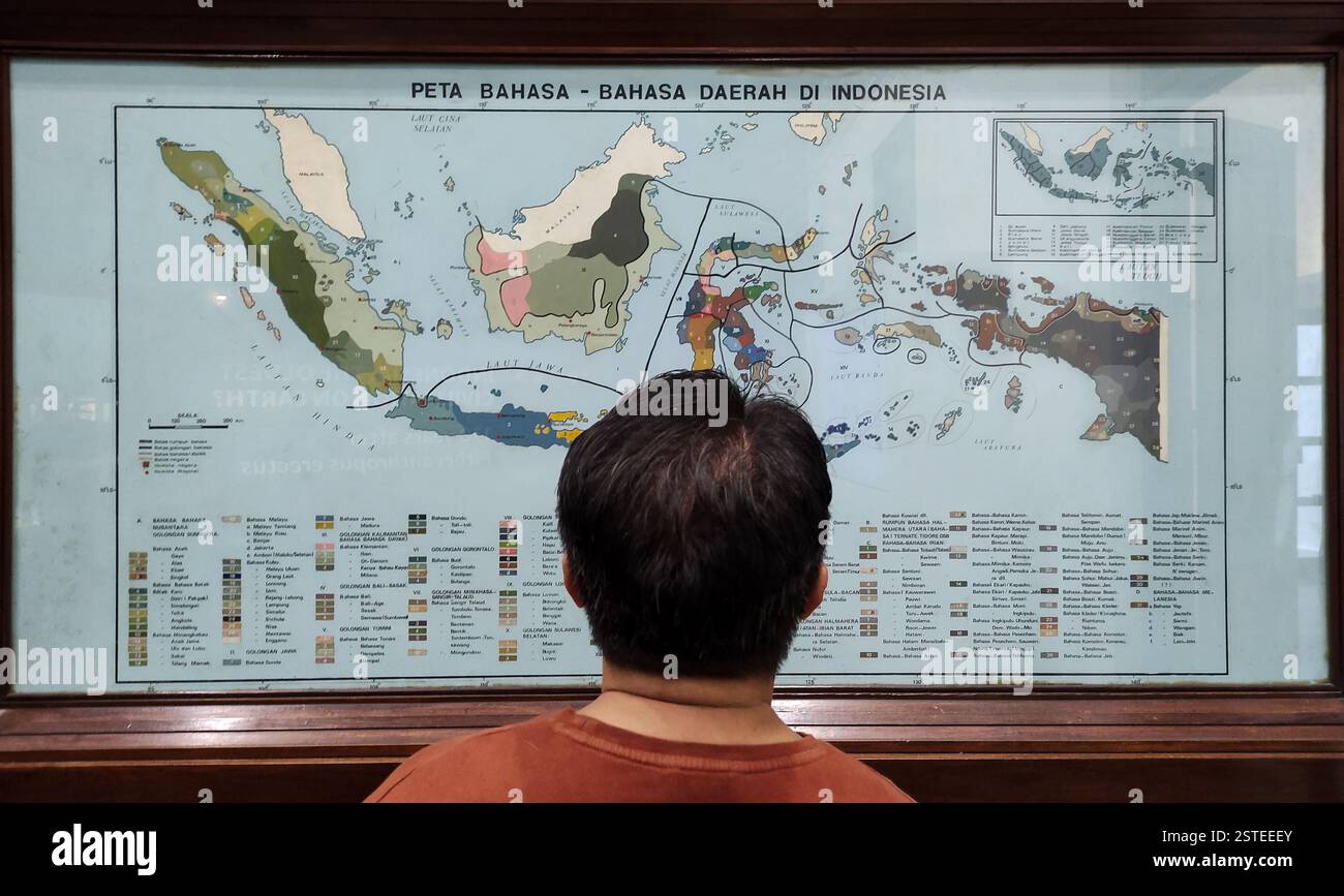 Jakarta, February 08, 2025: Person Examining Indonesian Regional ...