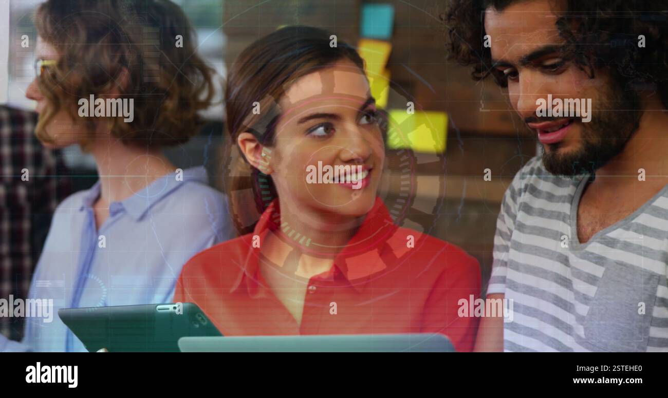 Diverse group collaborating over digital hi-res stock photography and ...