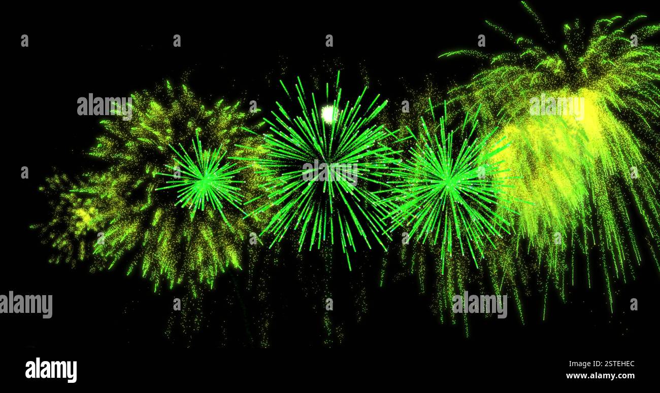 Green fireworks image bursting against black background Stock Photo - Alamy