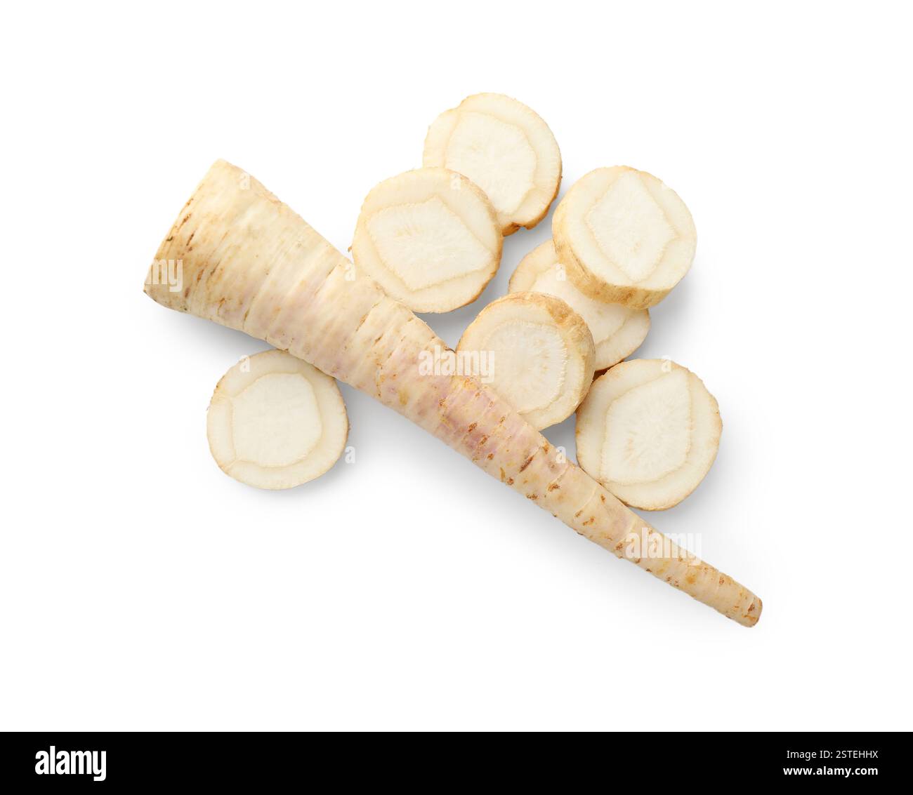 Cut fresh parsley roots isolated on white, top view Stock Photo - Alamy