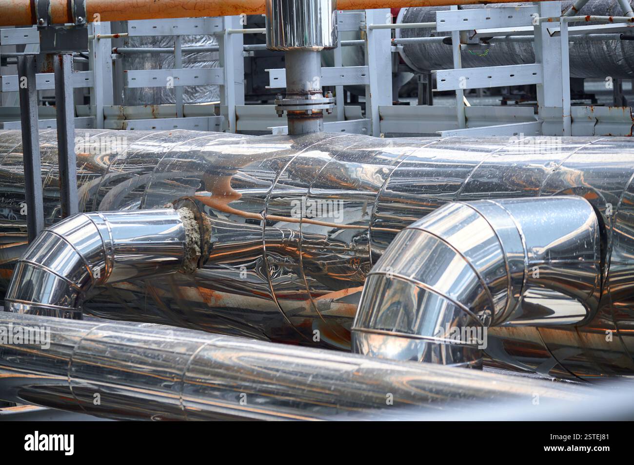 Industrial chemical plant with extensive pipelines showcasing ...