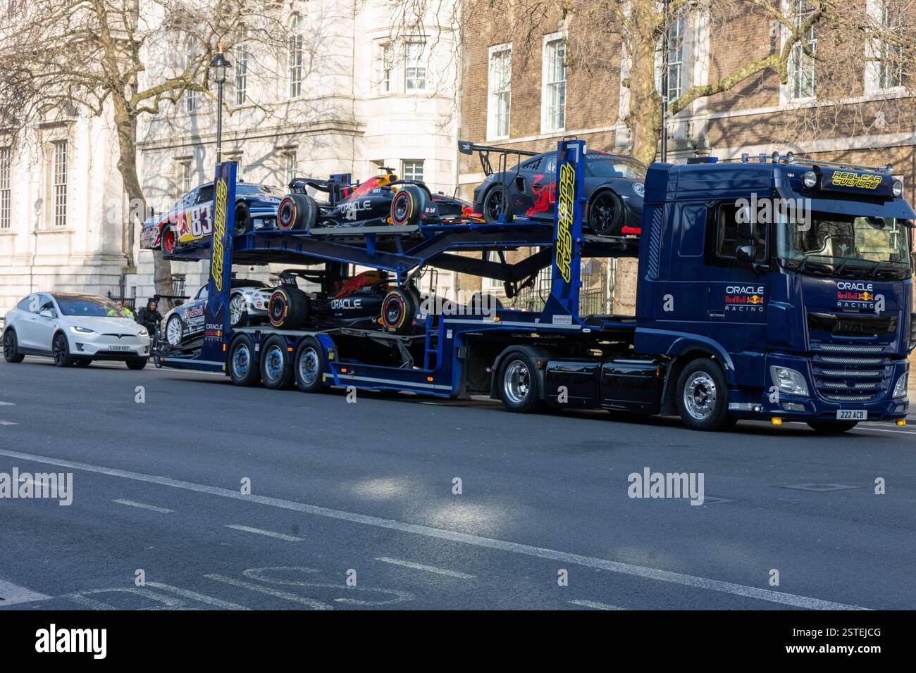 London, UK. 18th Feb, 2025. Red Bull racing convoy in Whitehall London ...