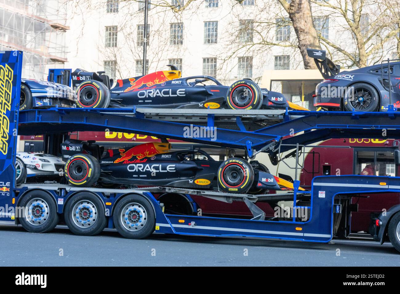 London, UK. 18th Feb, 2025. Red Bull racing convoy in Whitehall London ...