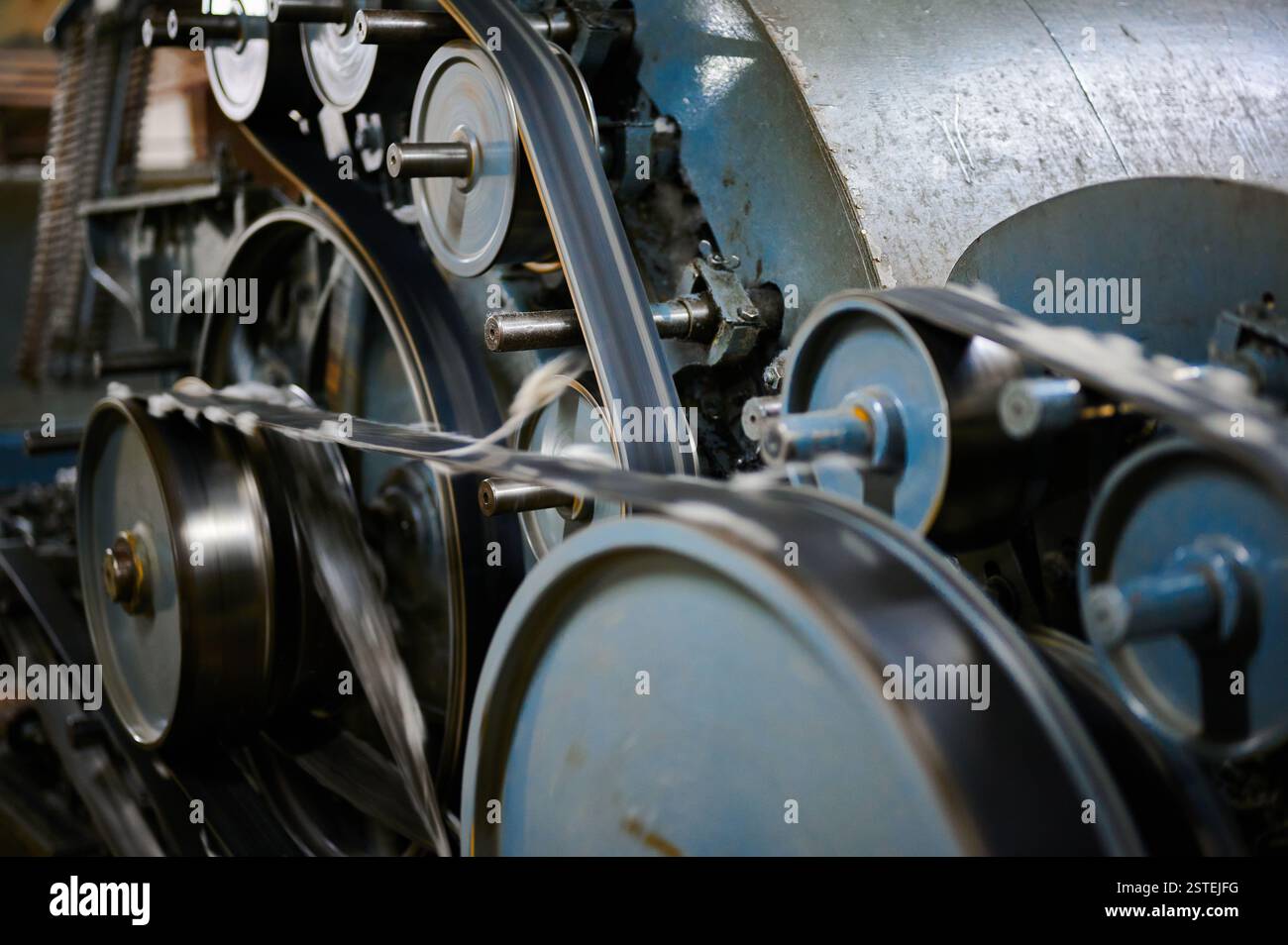 Exploring the intricate workings of a vintage carding machine in a ...