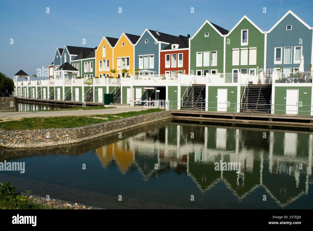 Colored wooden houses yellow hi-res stock photography and images - Alamy
