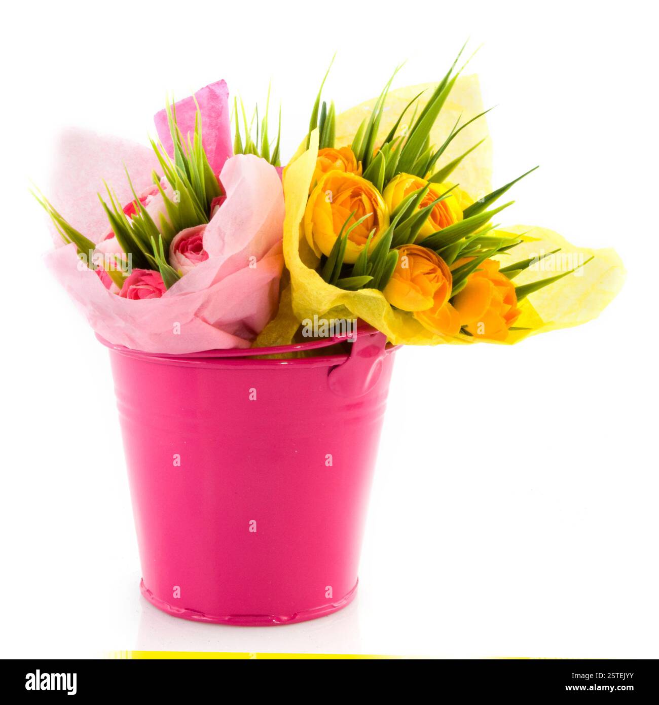 Pink bucket flowers Stock Photo - Alamy