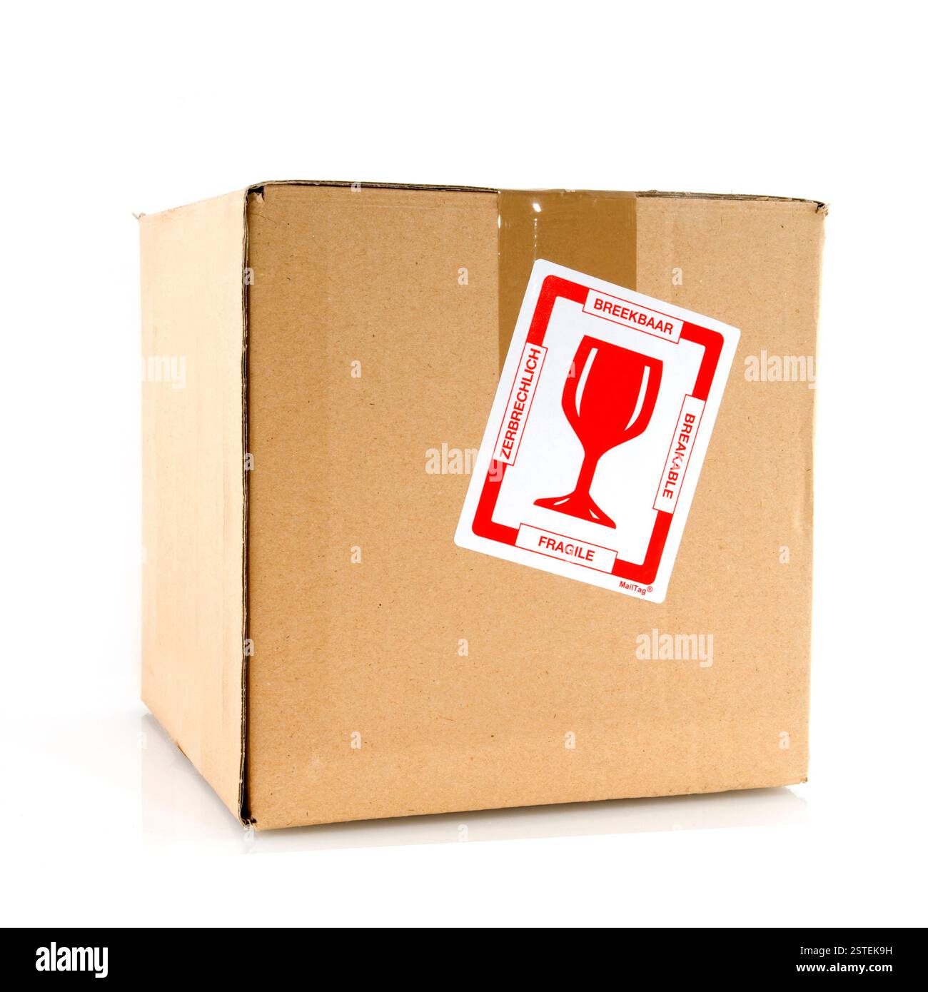 Fragile filled carton box Stock Photo - Alamy