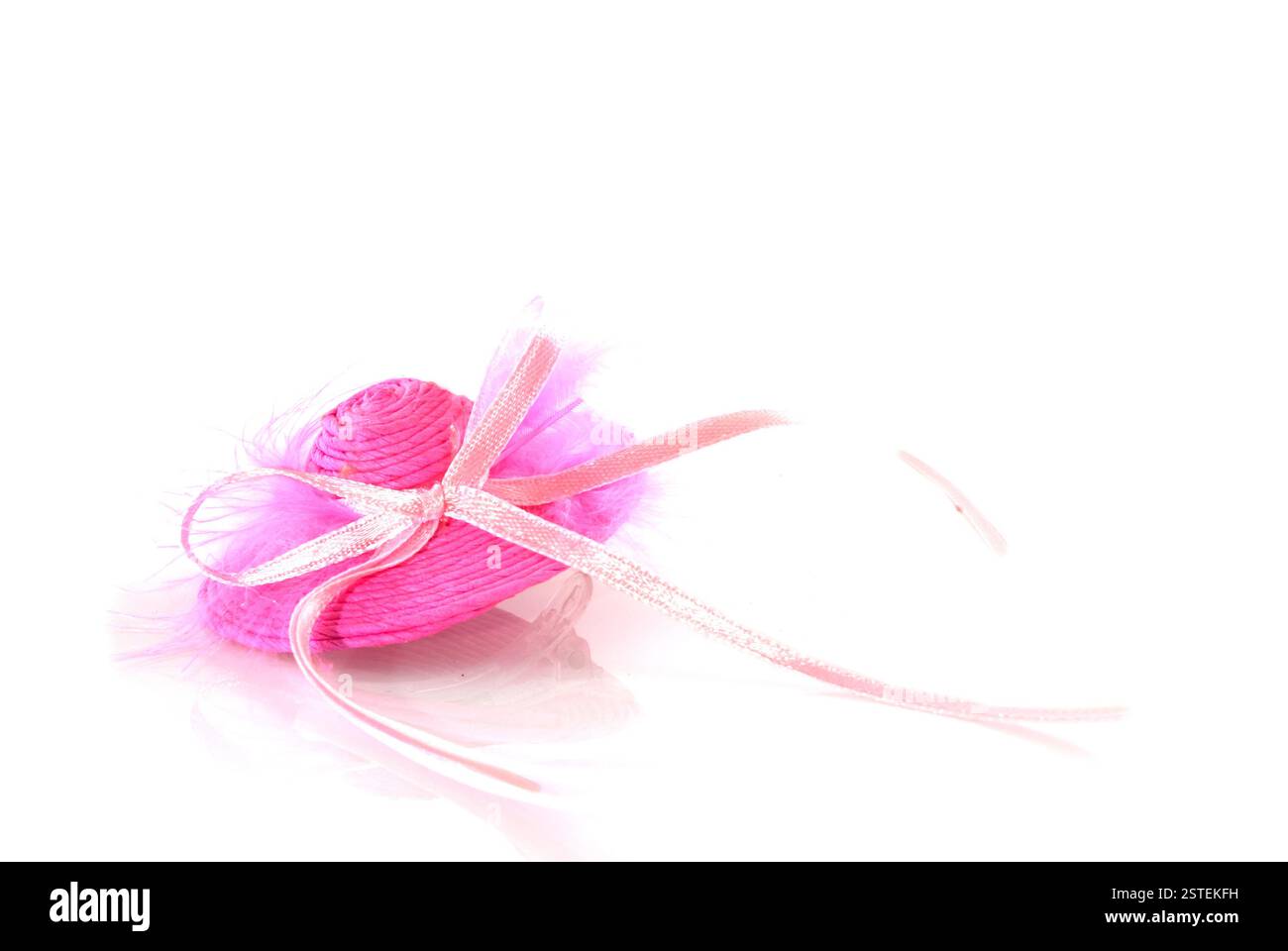 pink straw hat for the summer Stock Photo - Alamy
