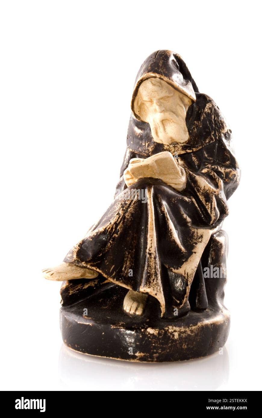 statue of sober franciscan monk who is reading the bible Stock Photo ...